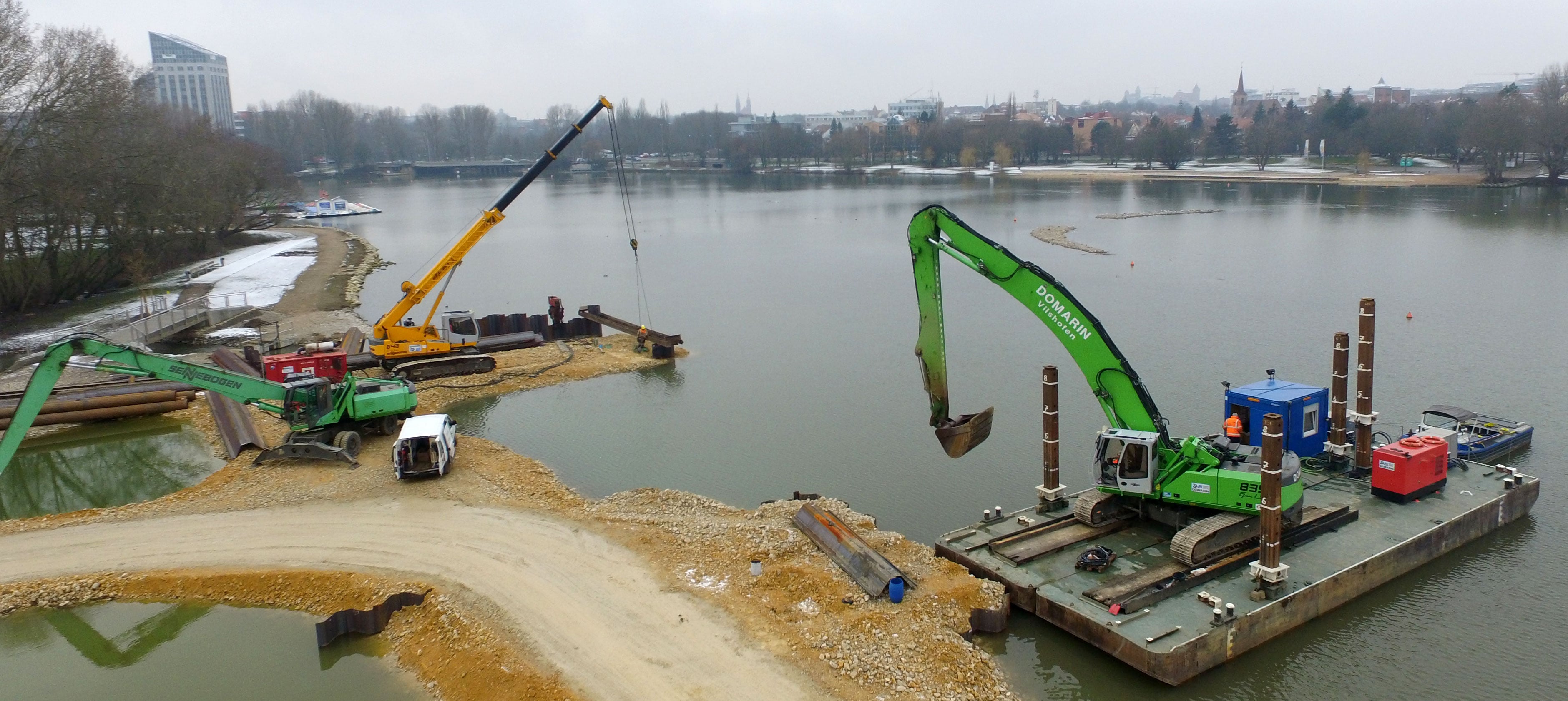 Telescopic crane and material handler place sheet pile walls in ...