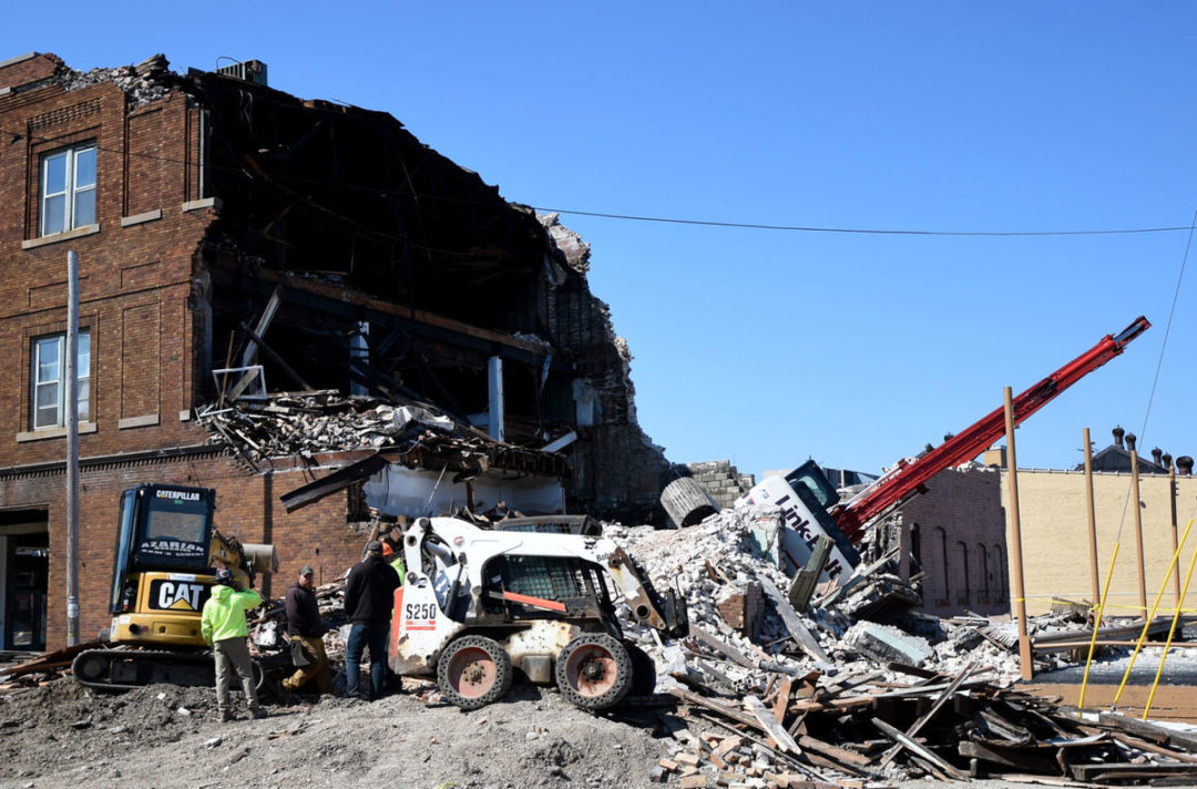 Link-Belt excavator tips over during a demolition project in Racine ...