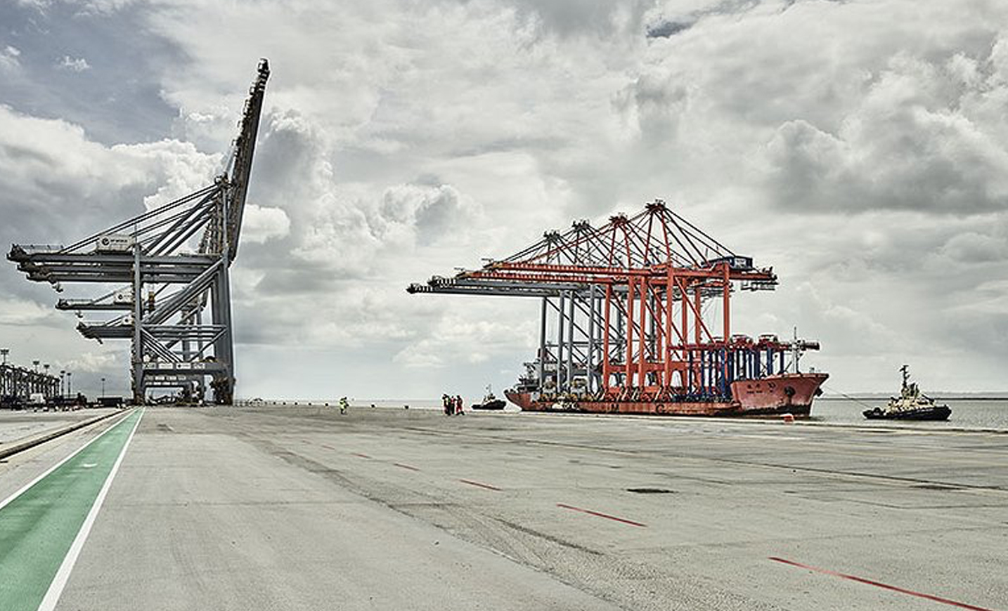 Enormous quay cranes brought up the river thames for the third berth at ...