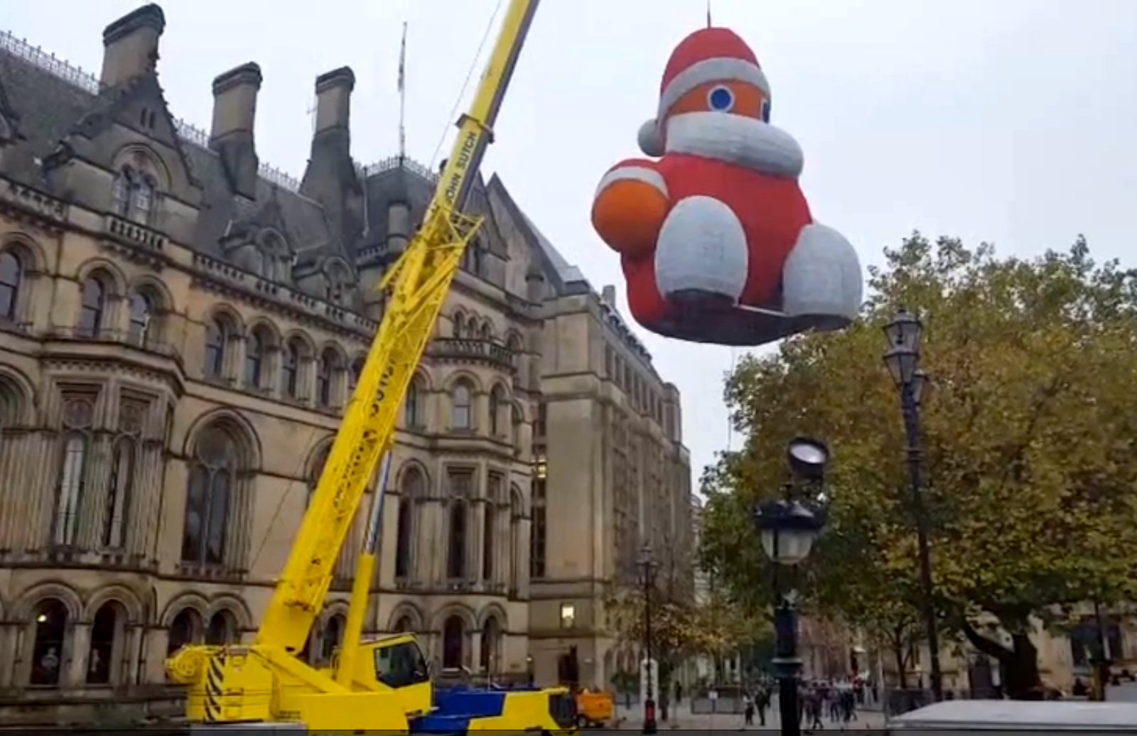 Santa Claus is back in Manchester City, UK as John Sutch Cranes hoists ...