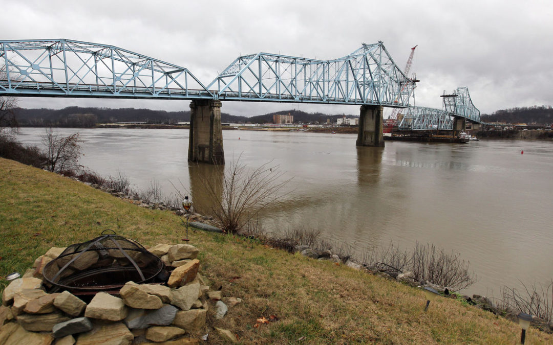 Pictures of Brayman Construction lowering a 375' center section of the ...