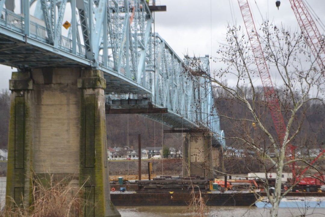 Pictures of Brayman Construction lowering a 375' center section of the ...