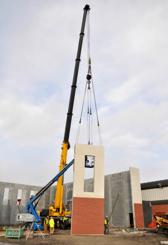 Dave’s Crane sets Precast Panels supplied by Wells Concrete with a ...