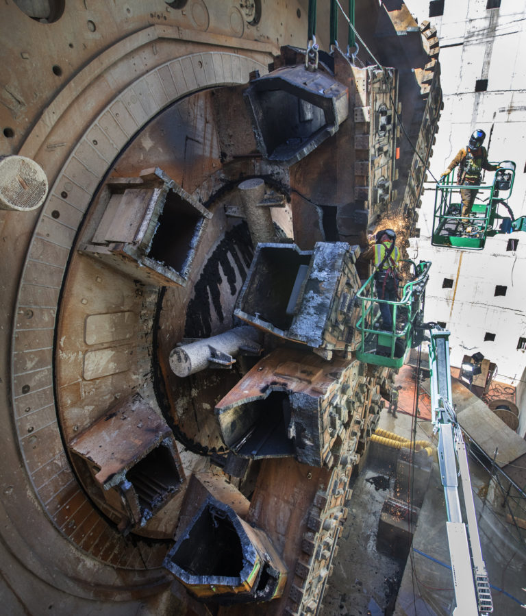 Crews are disassembly Bertha, the massive tunnel-boring machine in ...